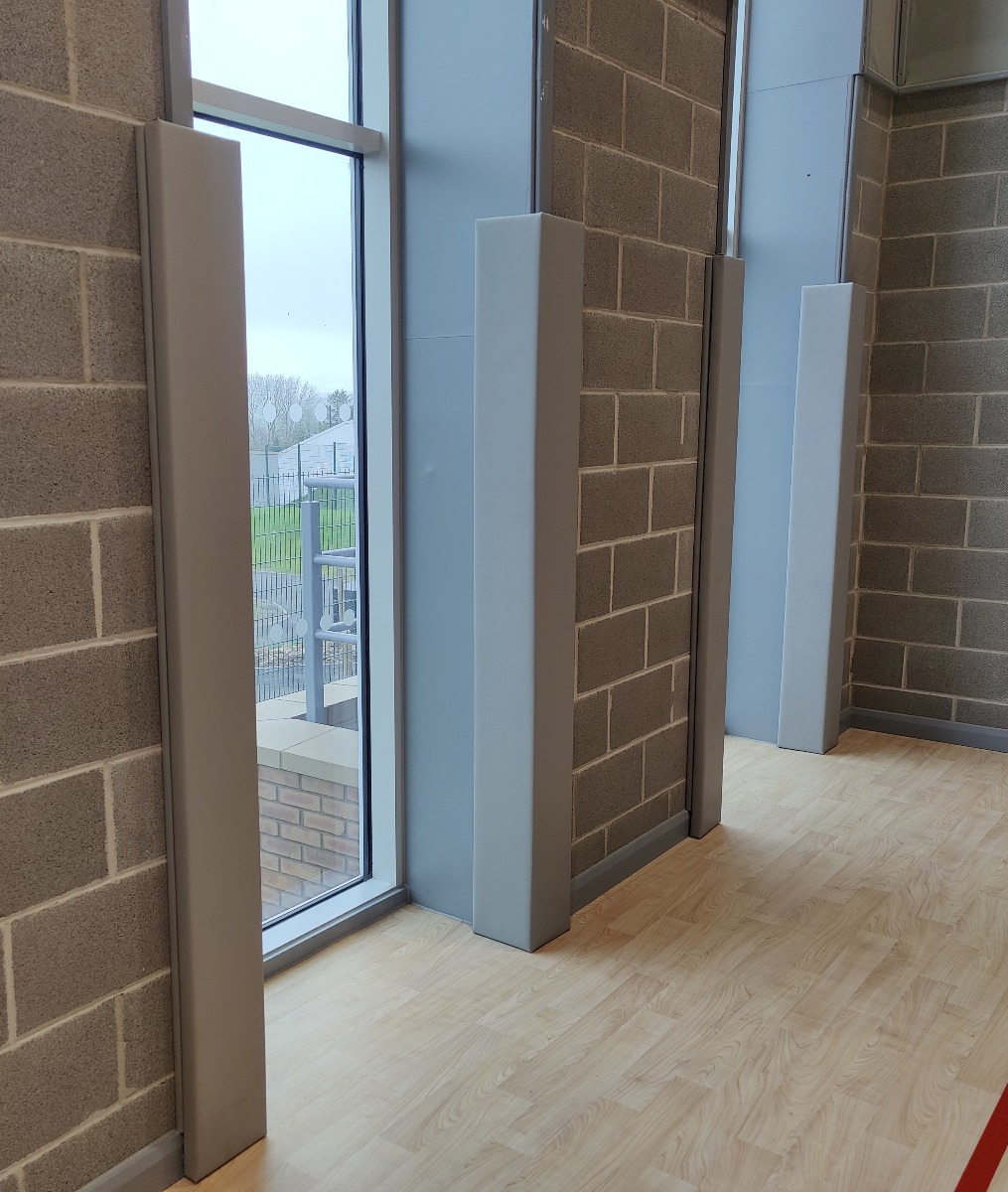 Sports hall fire exit door padding